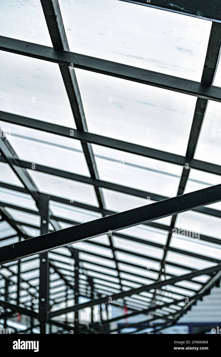 Metal canopy with transparent plastic roof. Modern building design ...