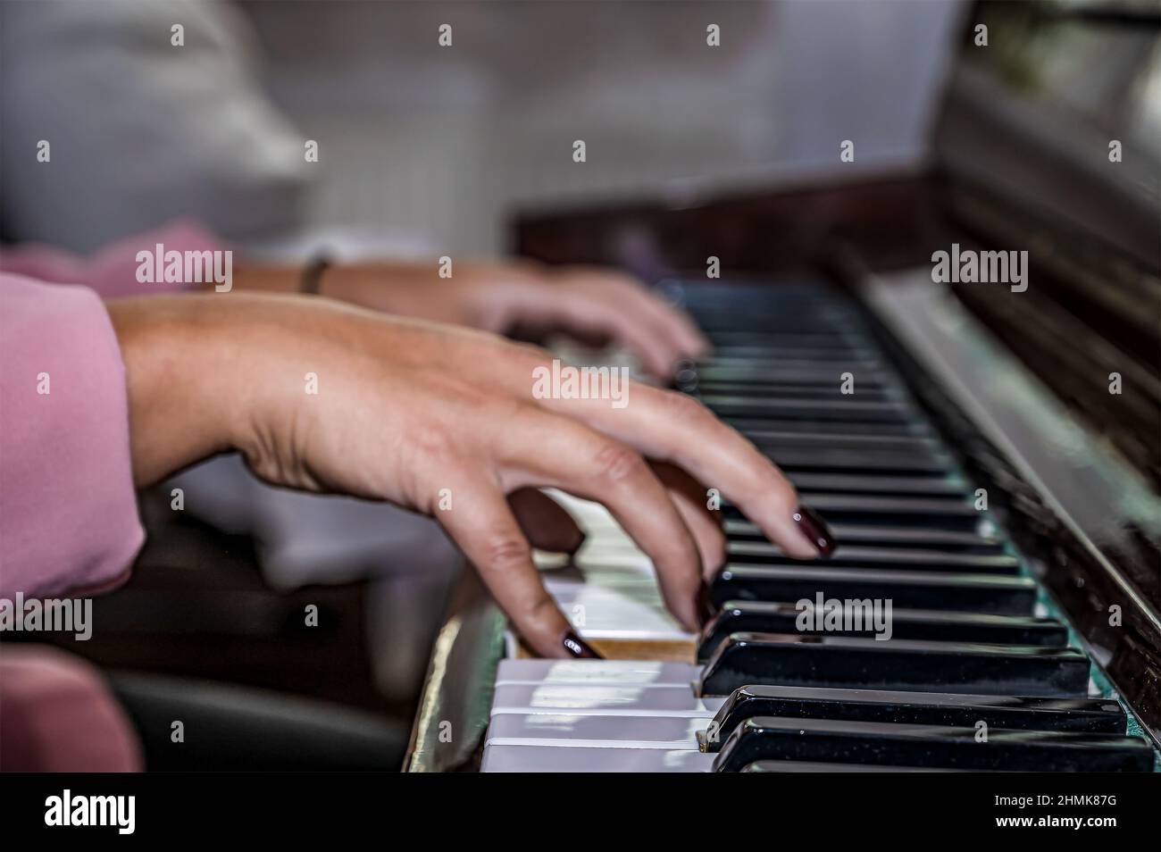 Female keyboard player performing High Resolution Stock Photography and ...