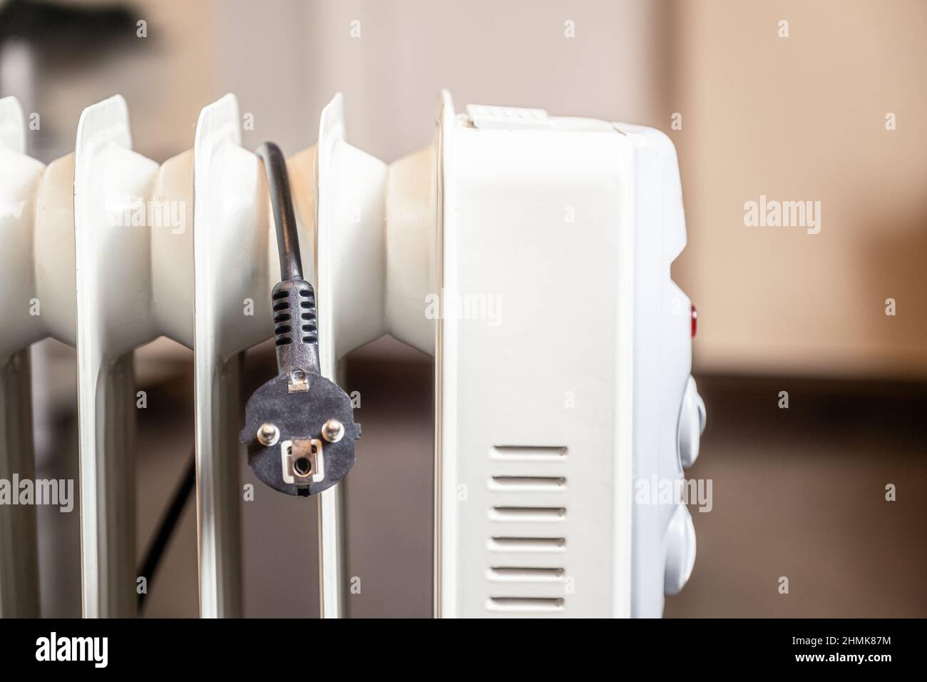 turned off the modern oil heater. The plug with the wire is thrown over ...