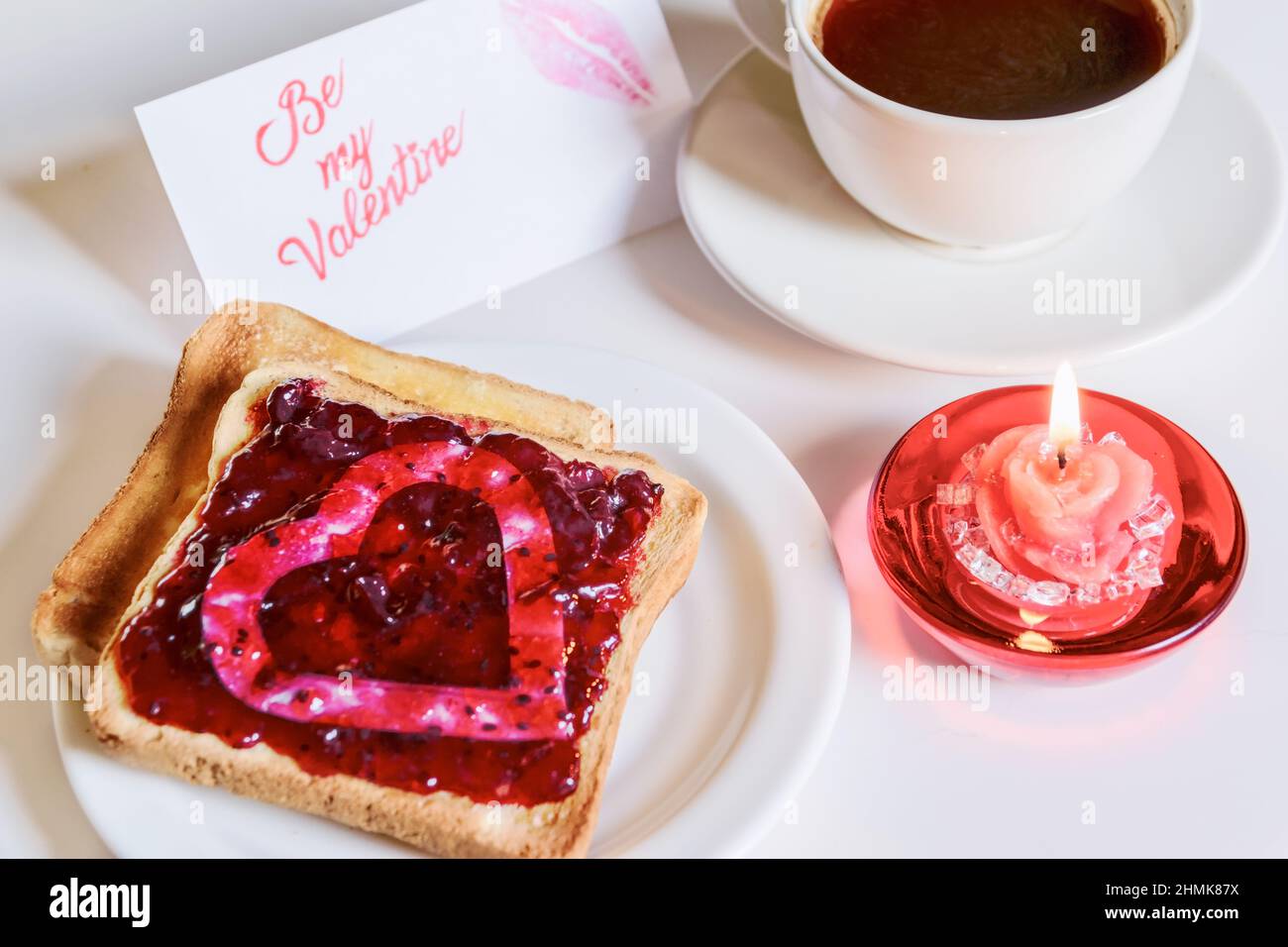 bread with strawberry jam for breakfast. burning candle and Be My ...