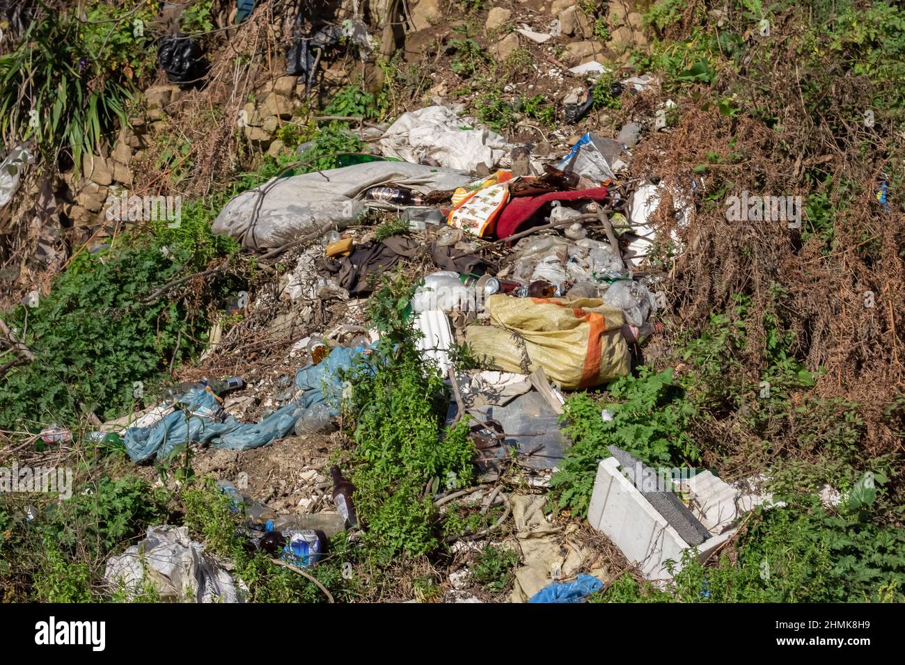 illegally landfill and dumping in nature. Trash at outdoor. Human ...