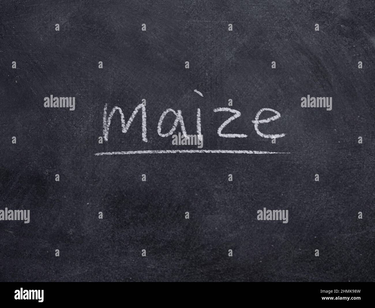 maize concept word on blackboard background Stock Photo - Alamy