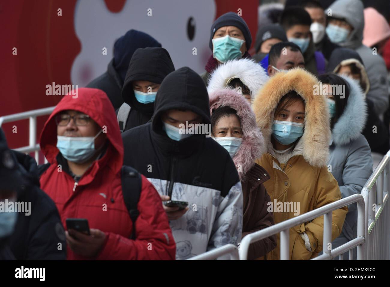 Beijing, China. 10th Feb, 2022. People seen in a queue outside the ...