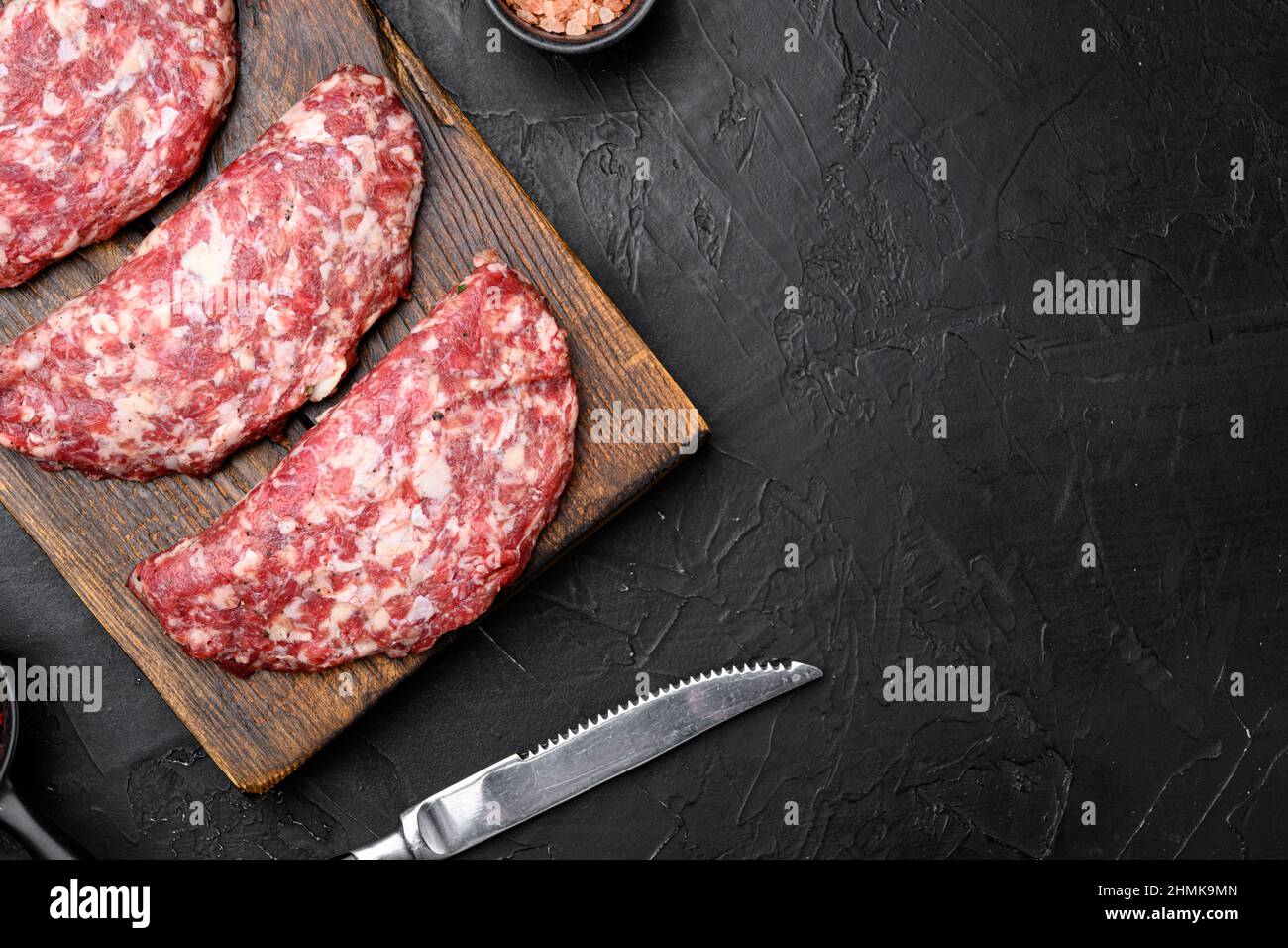 Ground raw meat patties. Meat cutlet ready to cook. Farm organic meat ...