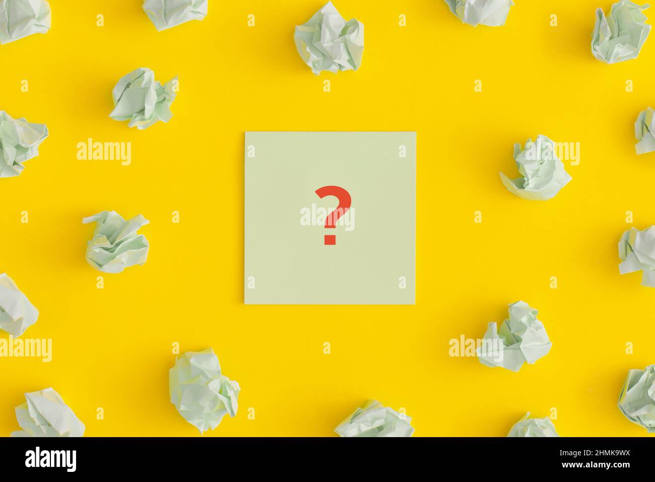 Sticky notes on yellow background. Question mark Stock Photo - Alamy