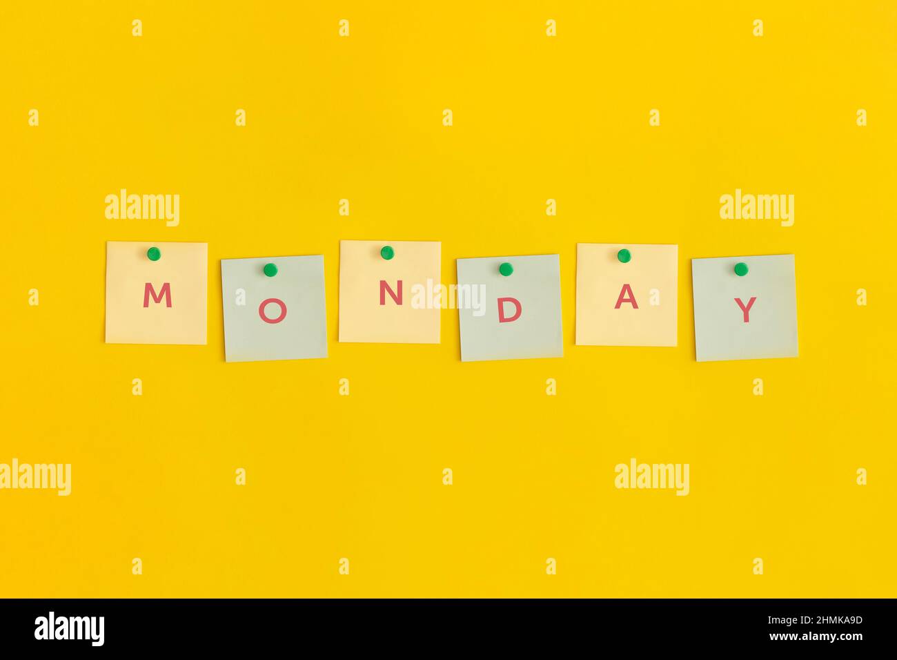 Sticky note with text Monday on yellow background Stock Photo - Alamy