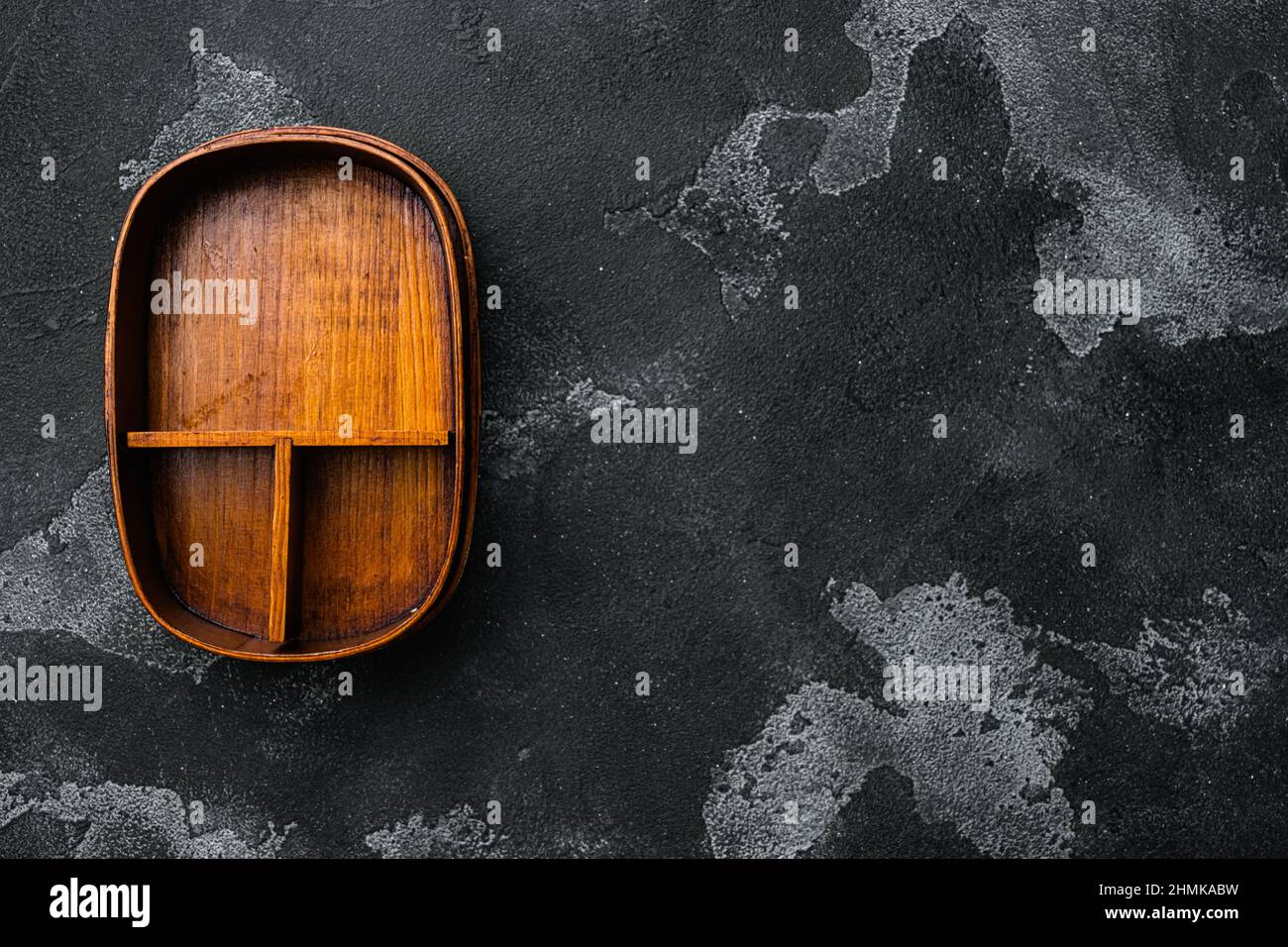 Open wooden bento box set with copy space for text or food with copy ...