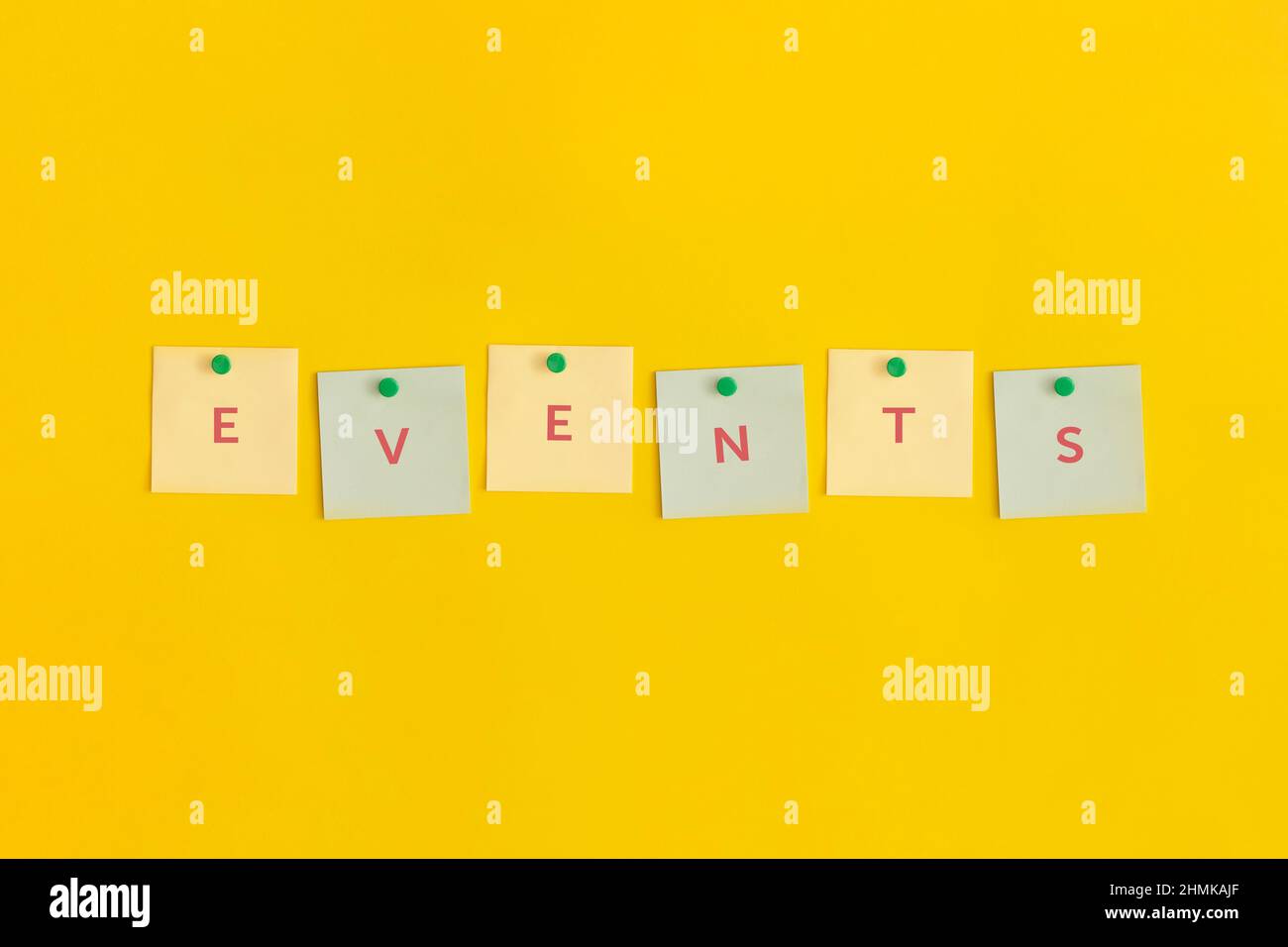 Sticky note with text Events on yellow background Stock Photo - Alamy