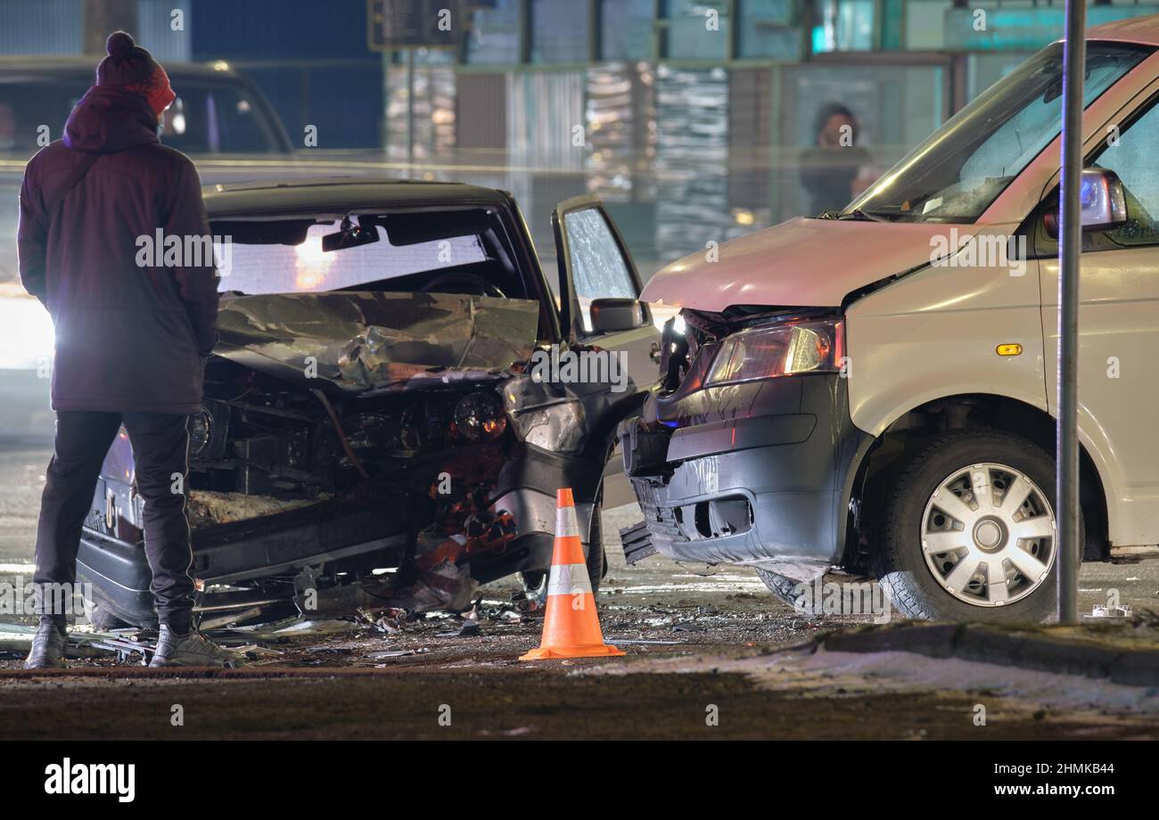 Cars crashed heavily in road accident after collision and silhouette of ...