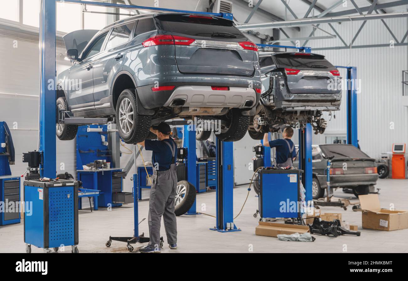 Car being repaired in garage hi-res stock photography and images - Alamy