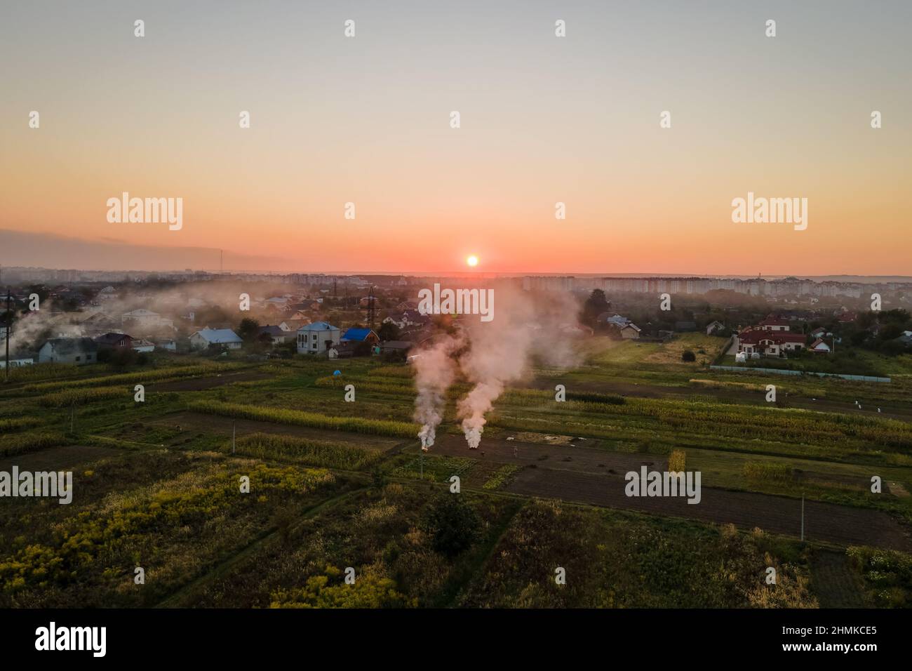 Aerial view of agricultural waste bonfires from dry grass and straw ...