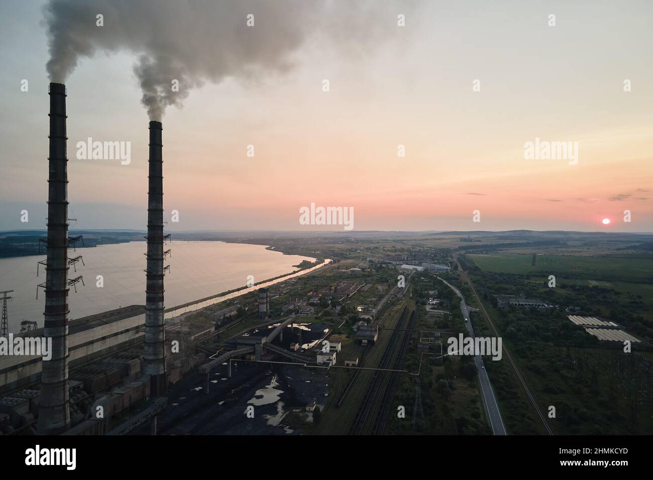 Aerial view of coal power plant high pipes with black smokestack ...