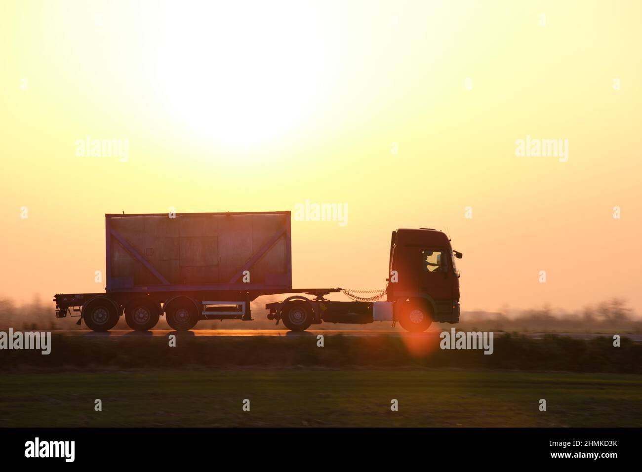 Petrol cargo truck driving on highway hauling oil products. Delivery ...