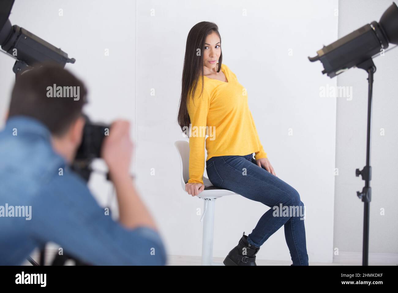 model posing during studio photo shoot Stock Photo - Alamy