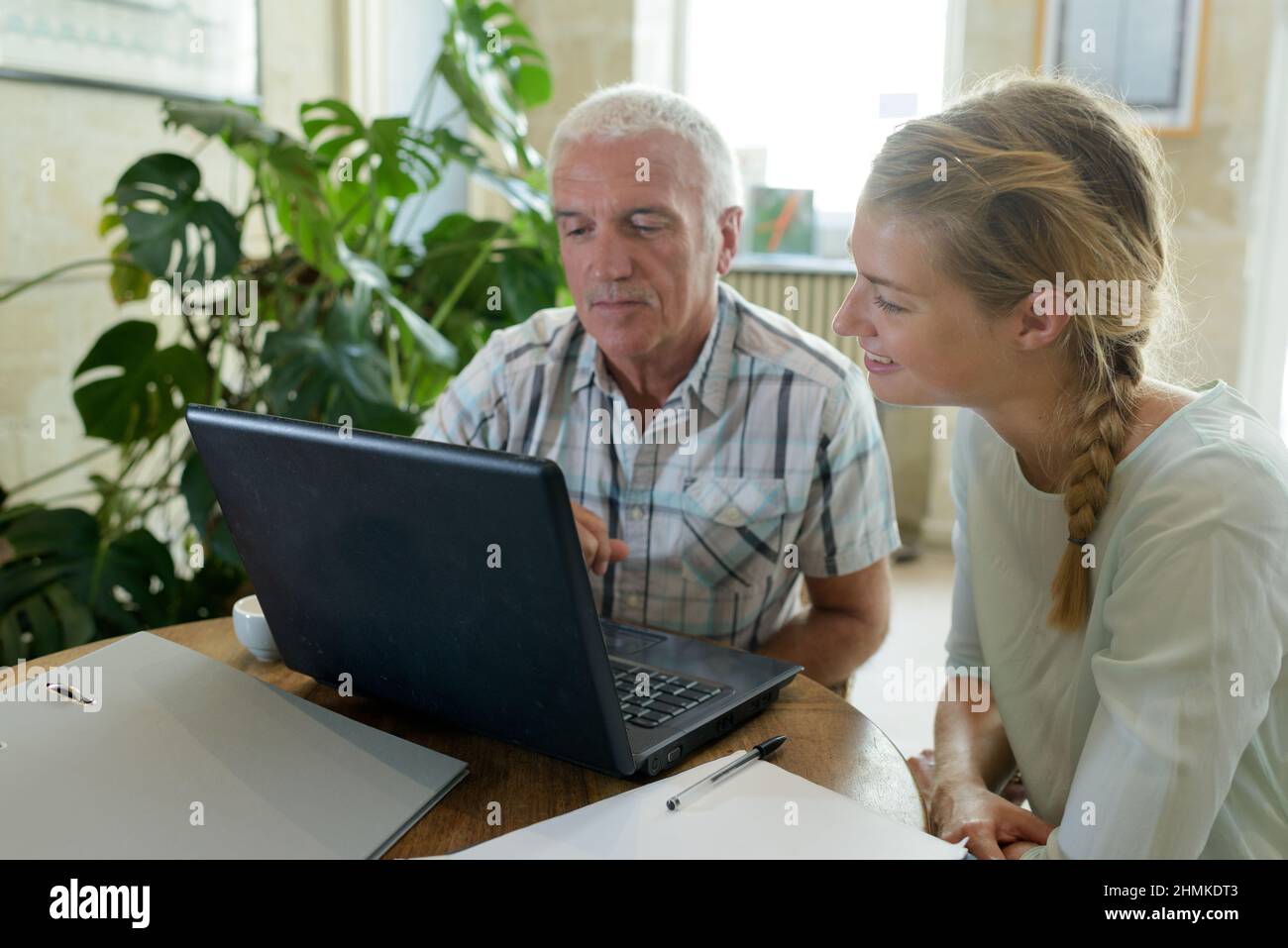 man in the office interviewing women for employment Stock Photo - Alamy