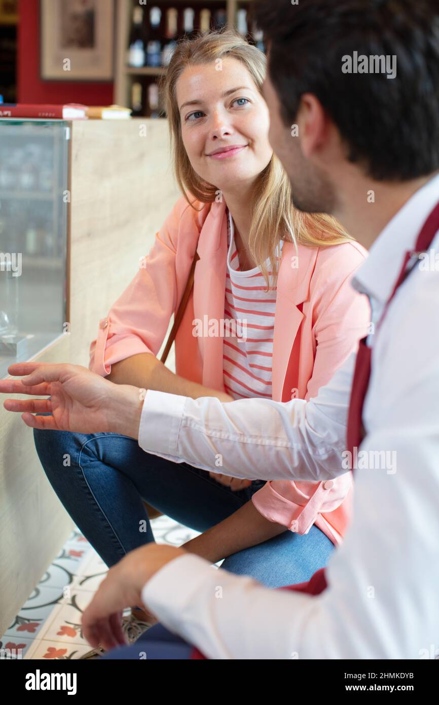 Bartender talking customer hi-res stock photography and images - Alamy