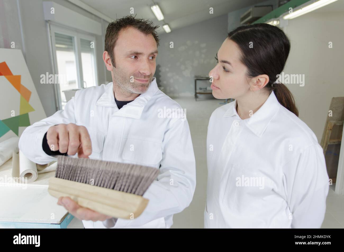 female painter apprentice with teacher Stock Photo - Alamy