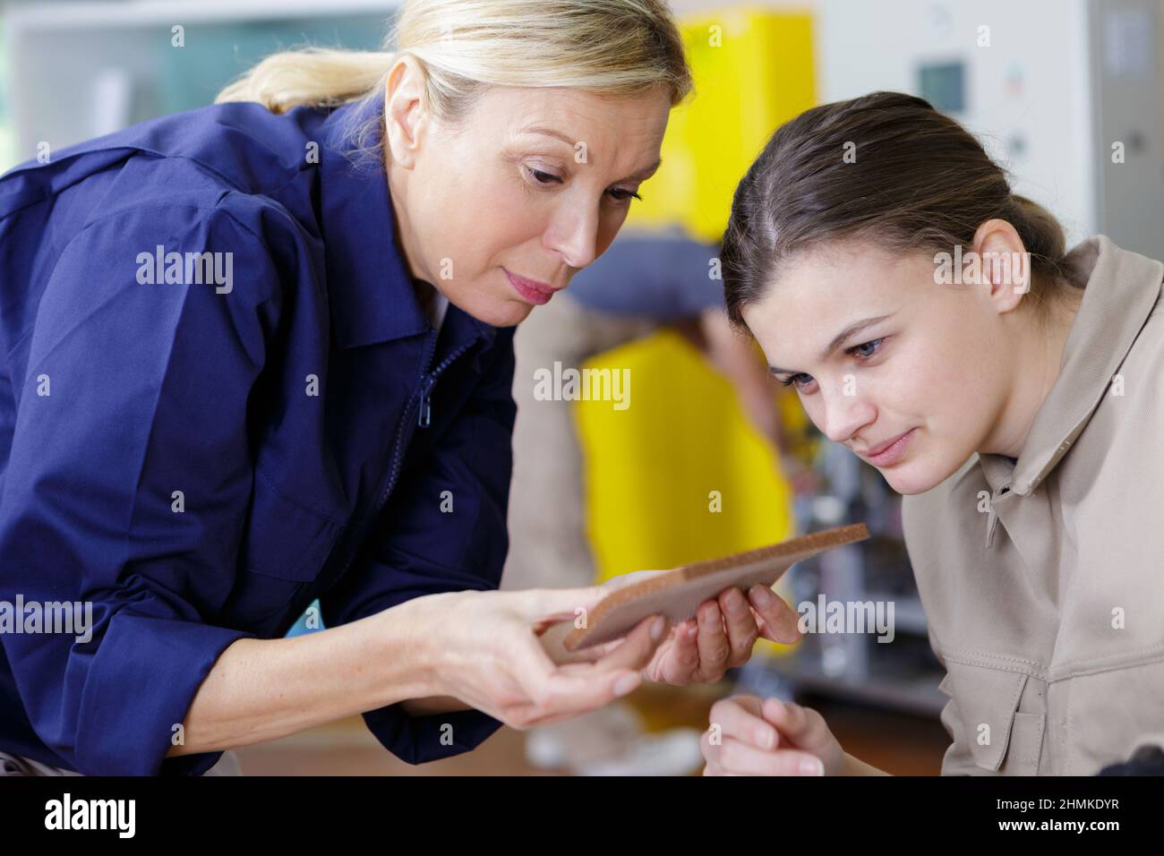woman teacher and woman apprentice Stock Photo - Alamy