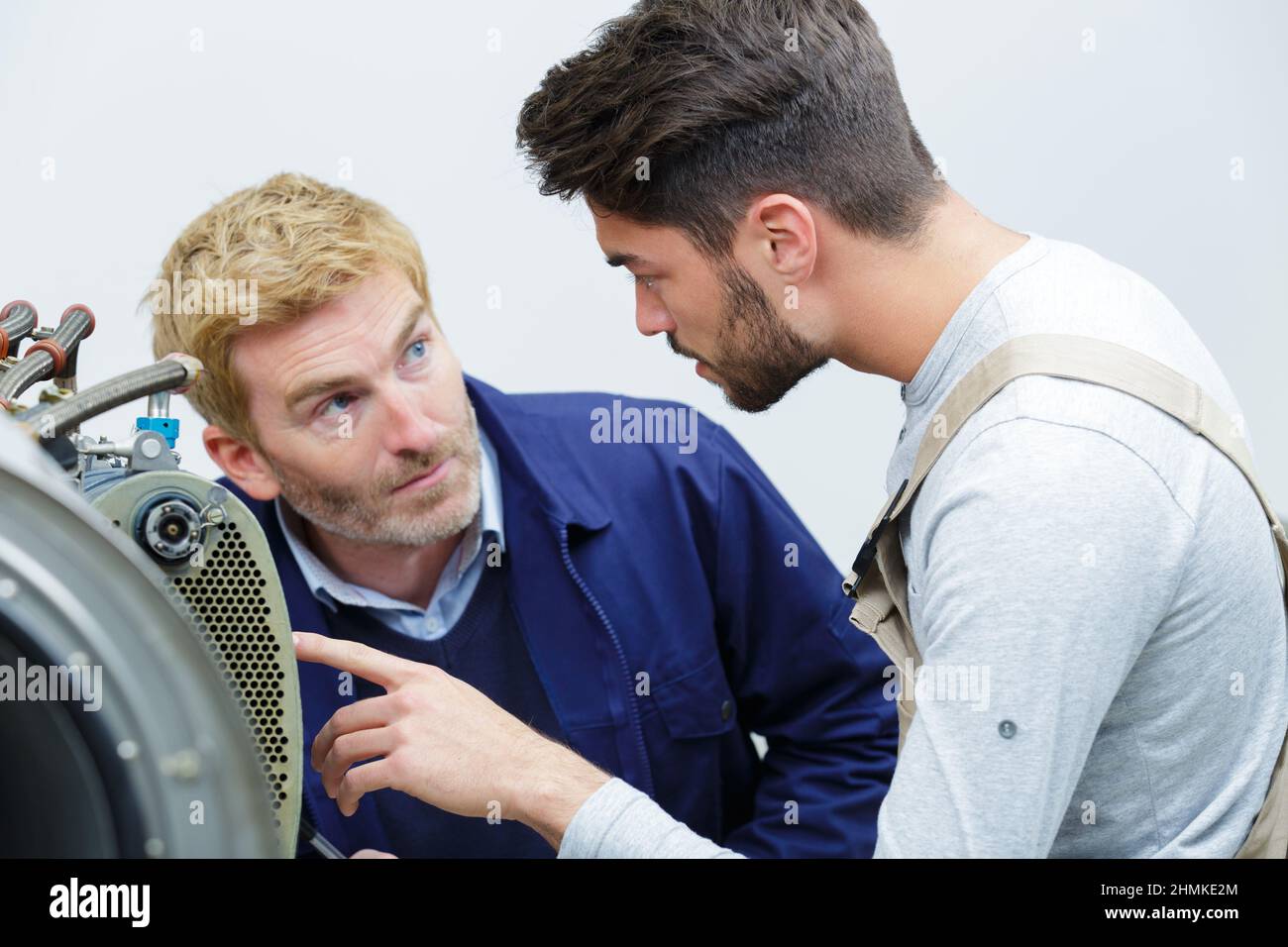 Inspecting antique hi-res stock photography and images - Alamy