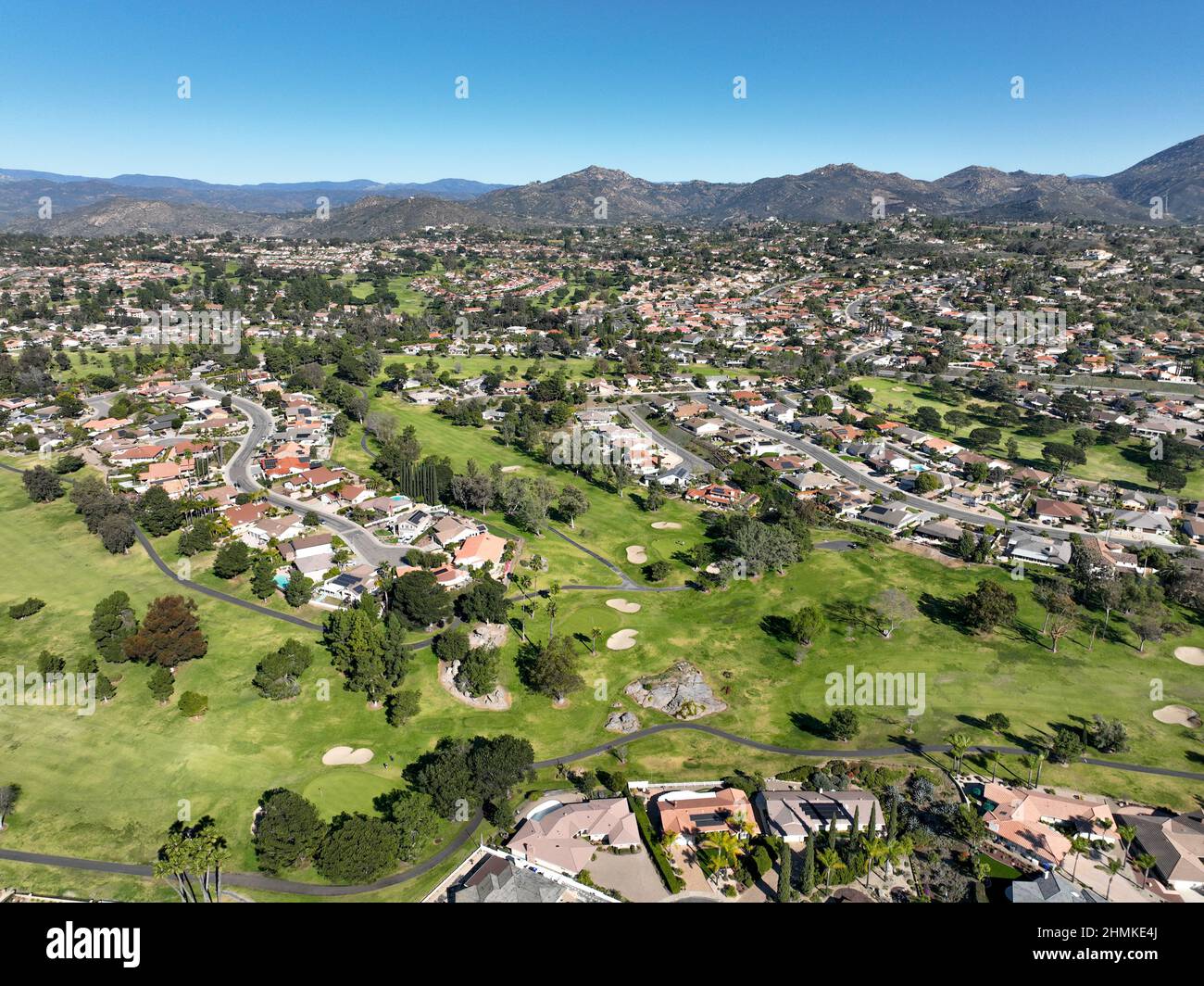 Aerial view of green golf in upscale residential neighborhood in South ...