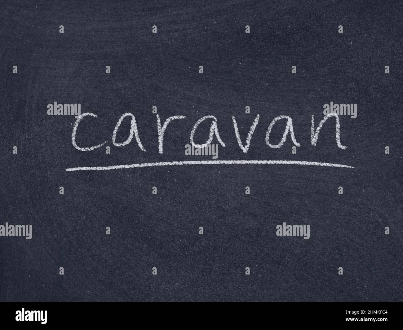 caravan concept word on blackboard background Stock Photo - Alamy