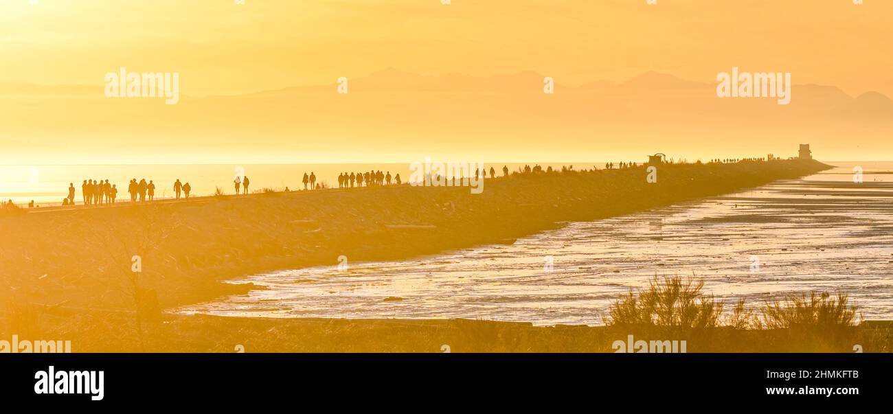 Sunset stroll, Iona Jetty, Iona Beach Regional Park, Richmond, British ...