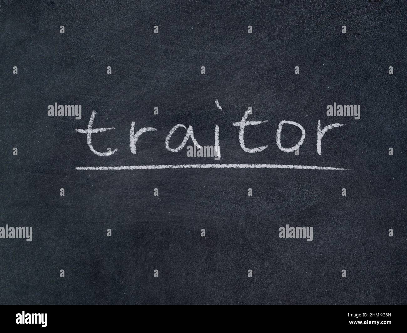 traitor concept word on blackboard background Stock Photo - Alamy