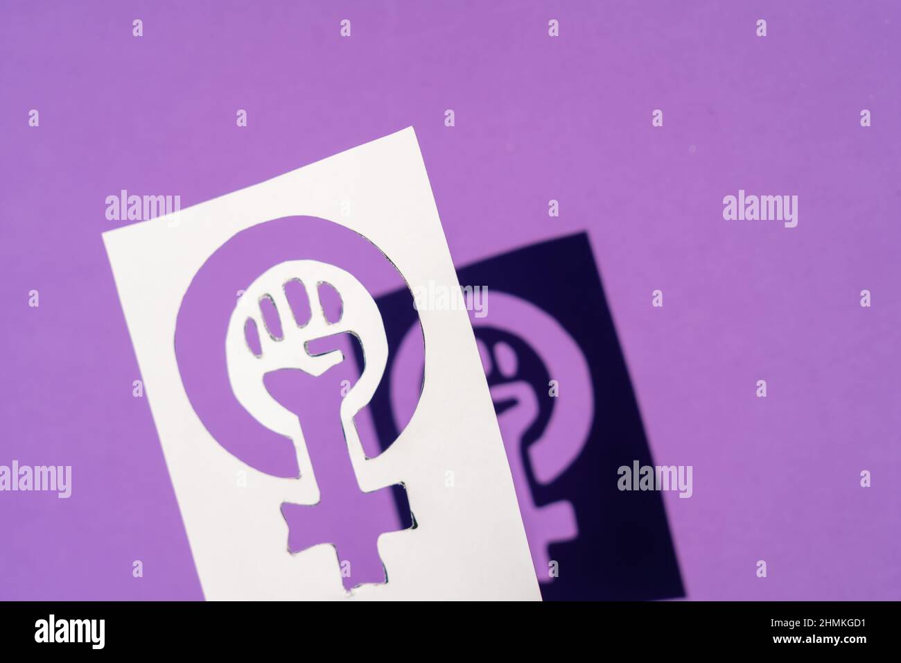 Closeup of the symbol of feminism on a purple background Stock Photo ...