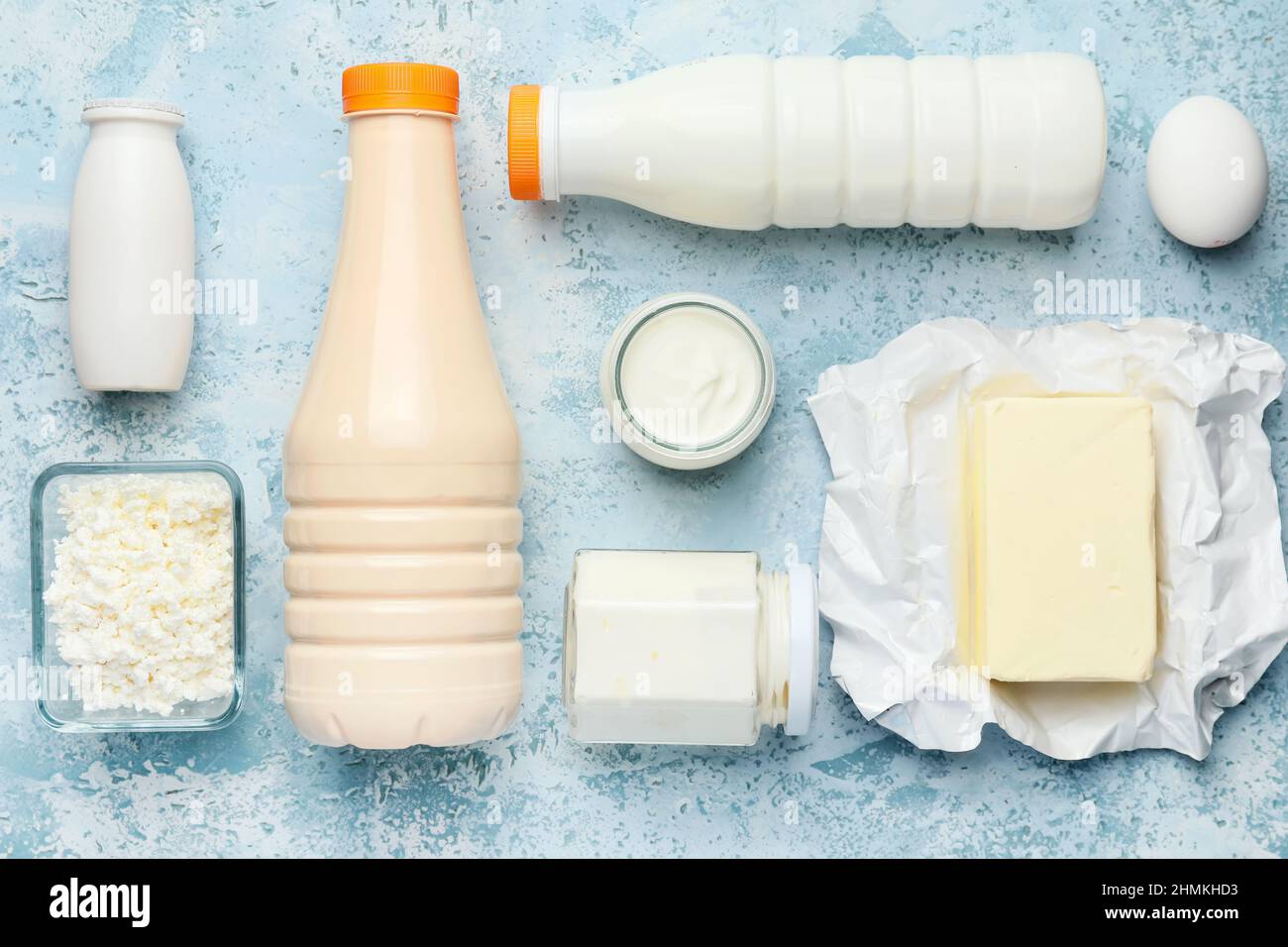 Different dairy products on color background Stock Photo - Alamy