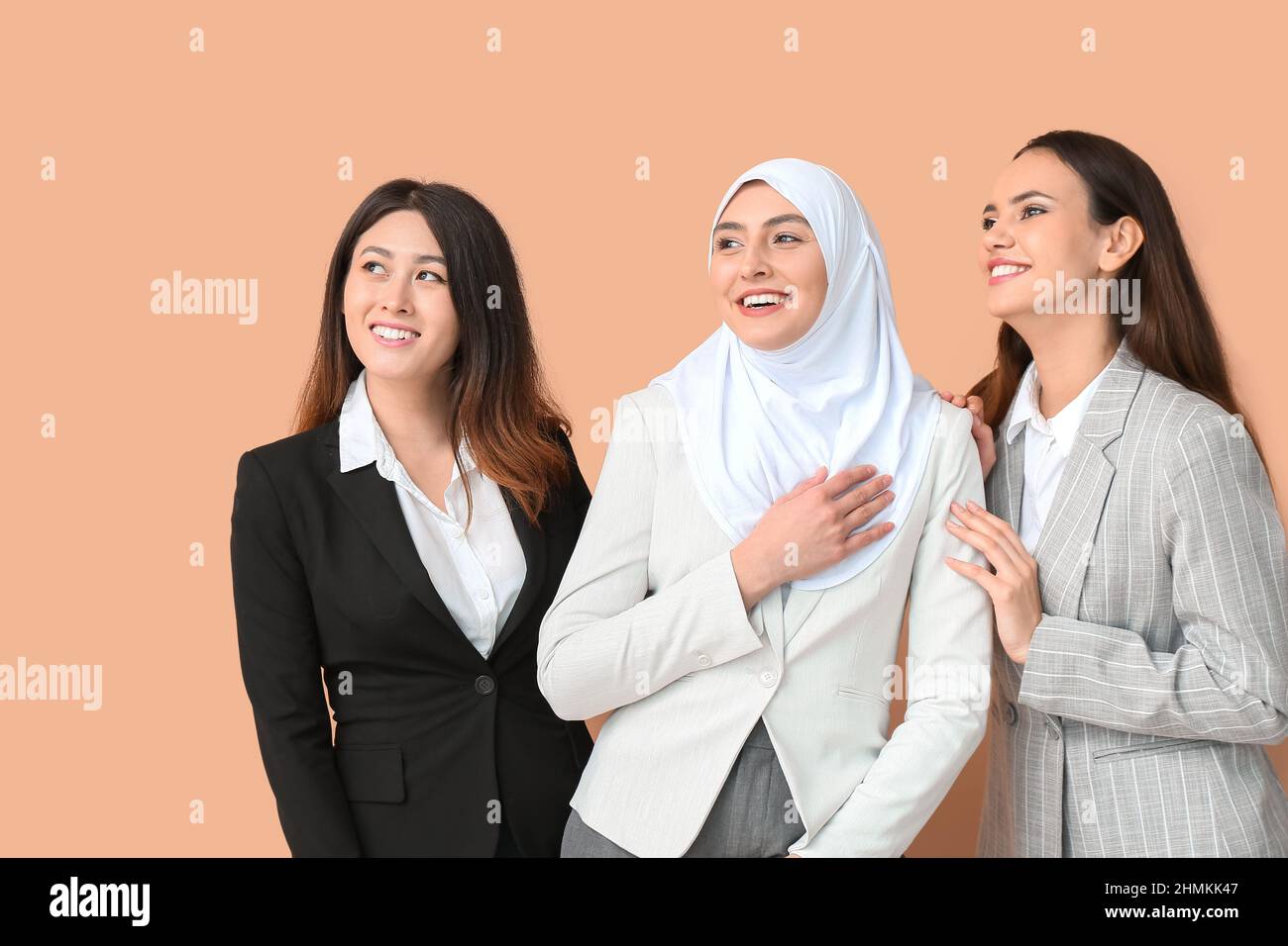 Beautiful women on color background. Unity concept Stock Photo - Alamy