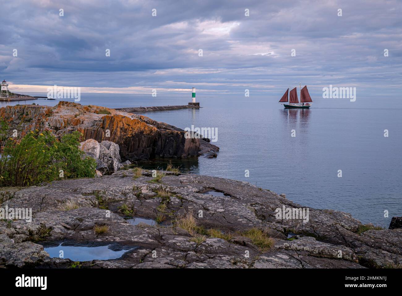 Lake Superior North Shore at Grand Marais, MN featuring a schooner ...