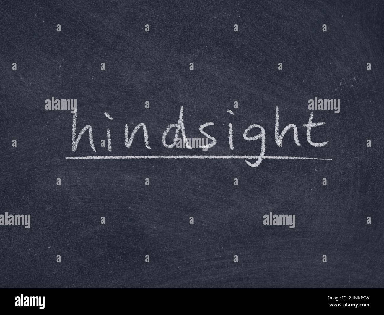 hindsight concept word on blackboard background Stock Photo - Alamy