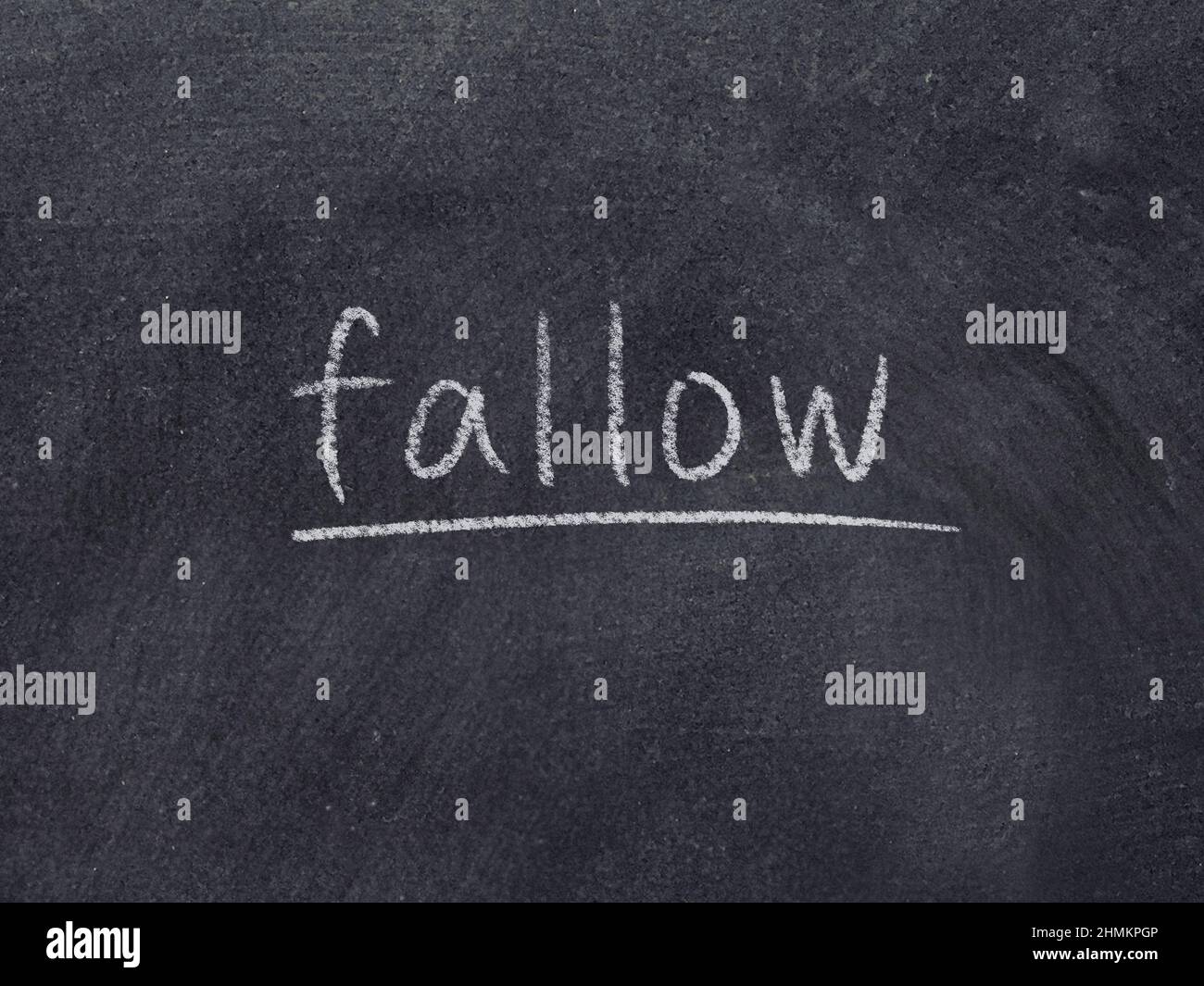 fallow concept word on blackboard background Stock Photo - Alamy
