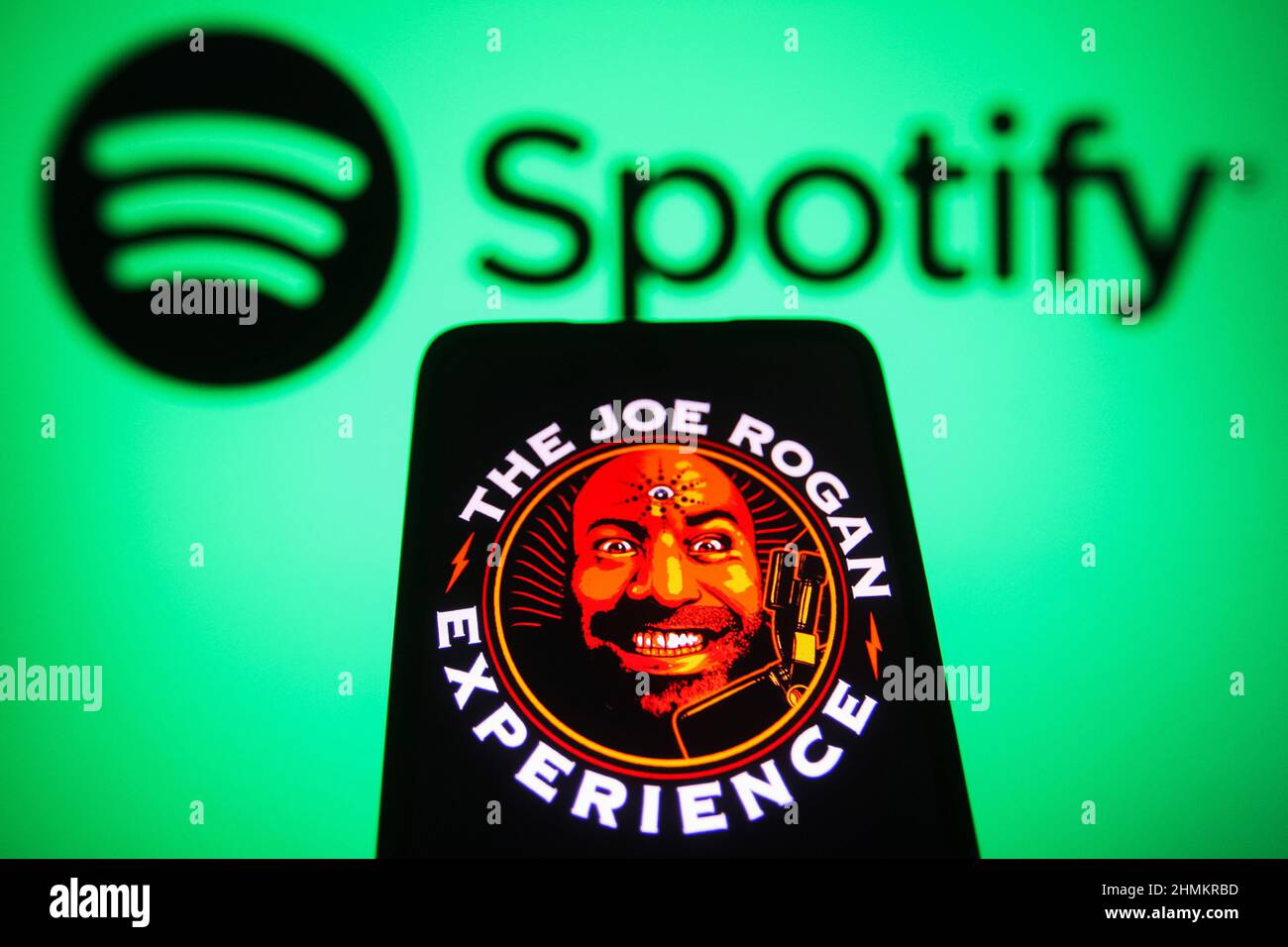 In this photo illustration, The Joe Rogan Experience podcast logo is ...