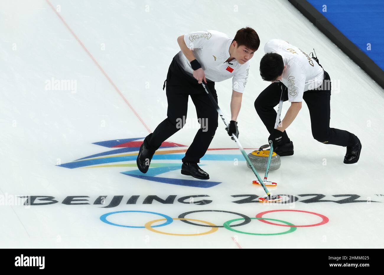 Beijing, China. 11th Feb, 2022. Wang Zhiyu (L) and Xu Jingtao of China ...