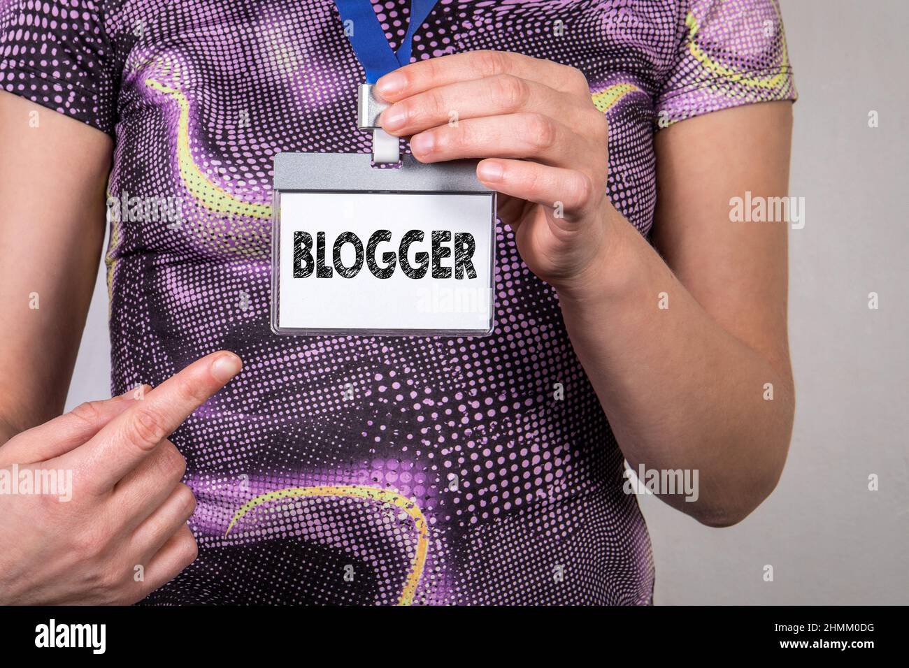Blogger. Profession and making money. Woman showing name tag Stock ...