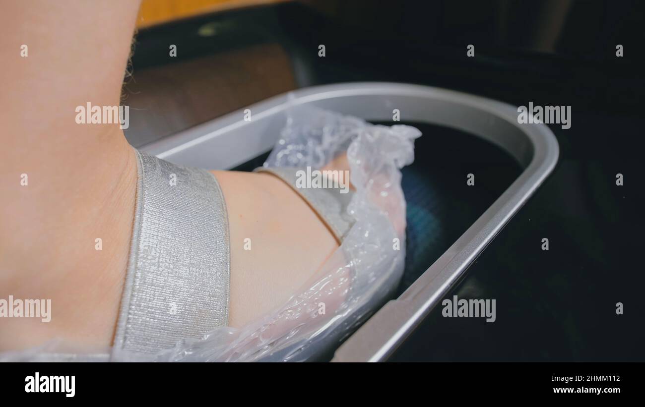 Automatic Thermal Shrinkable Shoe Cover Laminating Machine. Close up ...