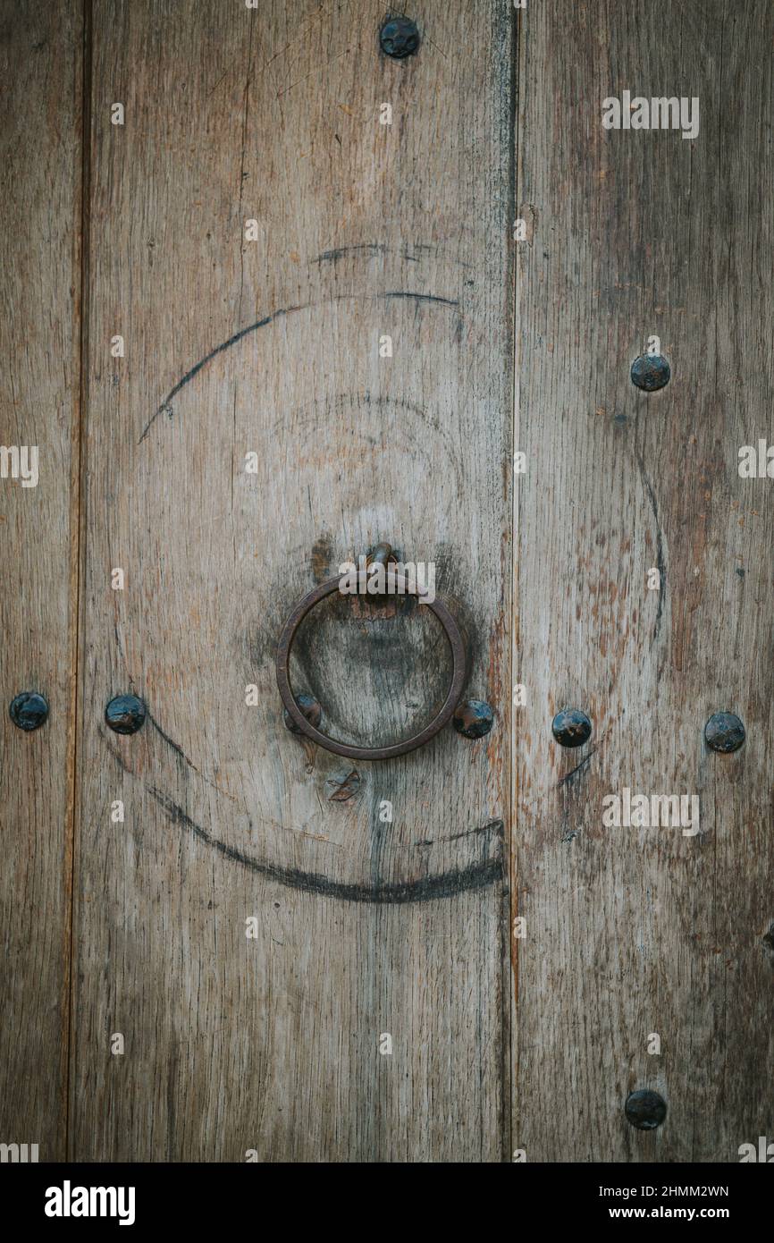 Vertical shot of an old wooden door rings Stock Photo - Alamy