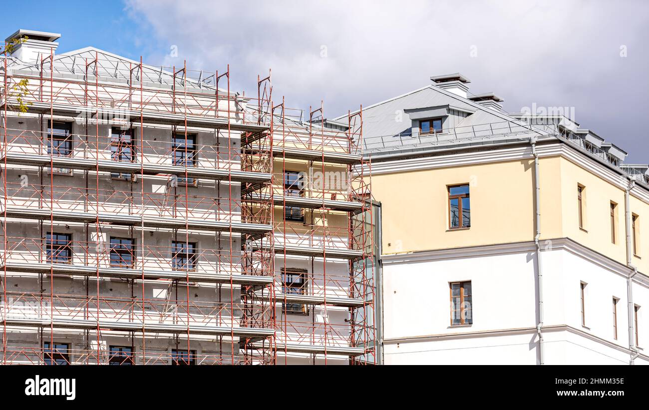building with scaffolding. preparation before the reconstruction of ...
