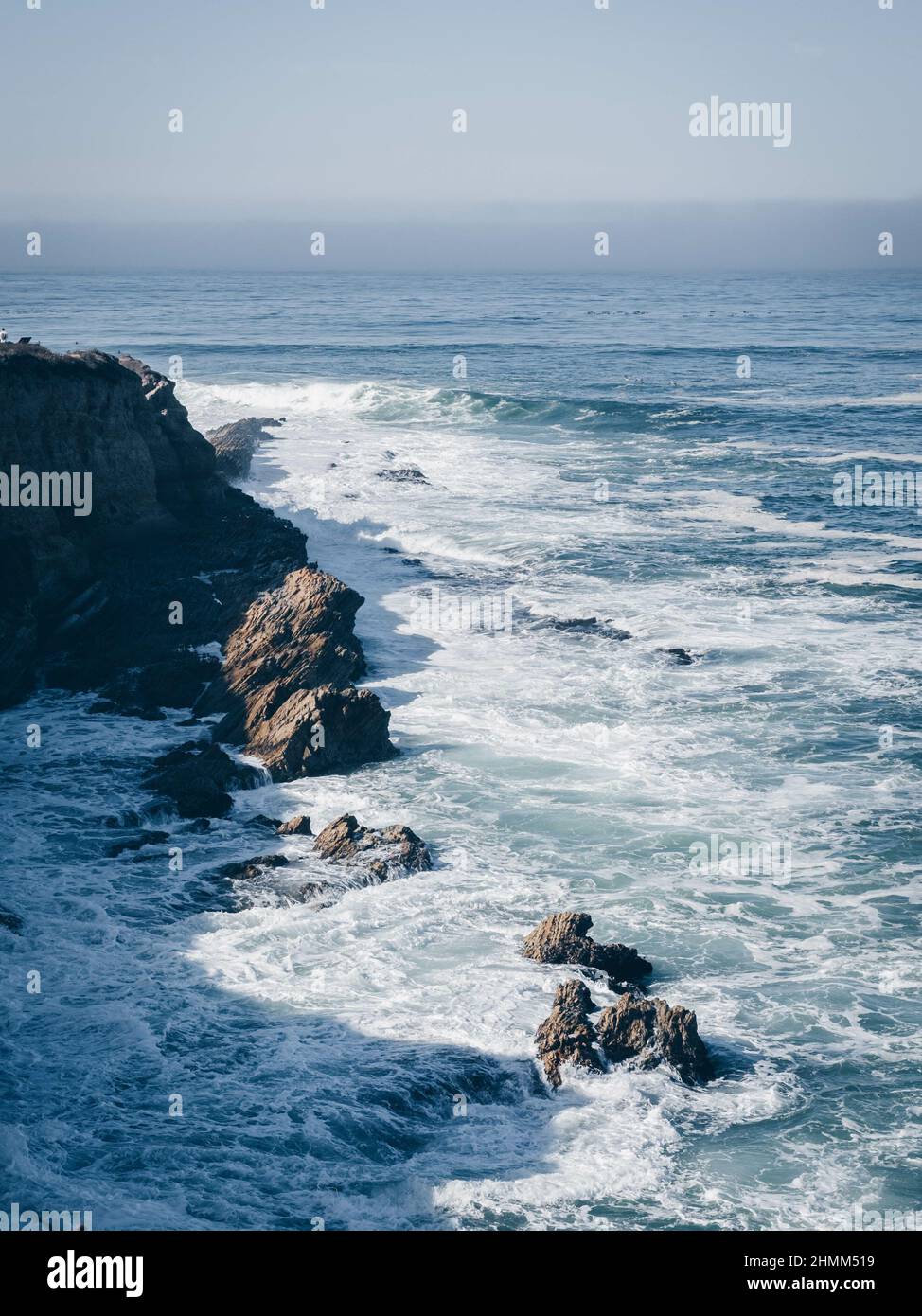 Natural view of strong waves hitting a rocky coast Stock Photo - Alamy