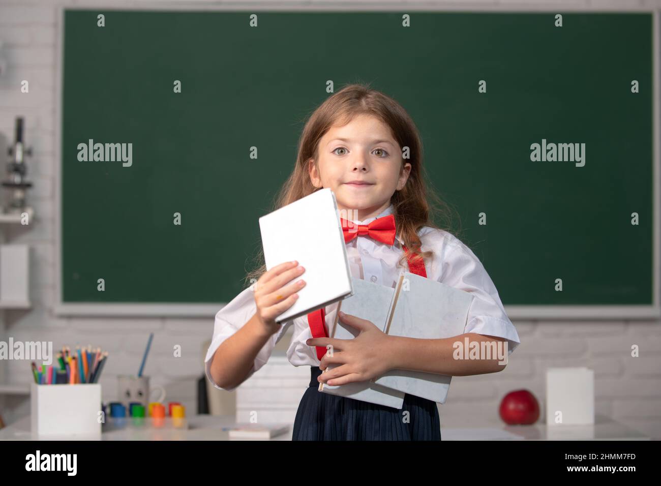 Little school girl student learning in class, study english language at ...