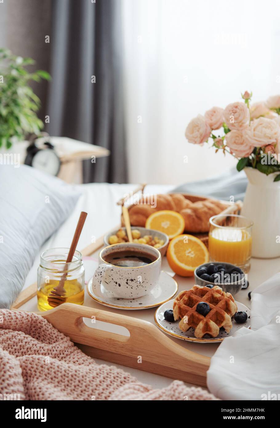 Romantic breakfast with coffee, croissants and rose flowers Stock Photo ...