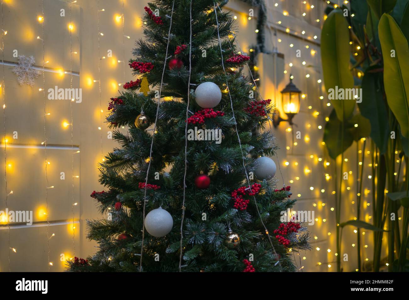 Decorated Christmas tree with christmas toys and garland. Happy new ...