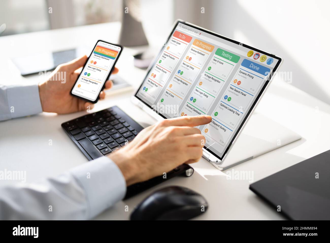 Project Manager Using Agile Software In Office Stock Photo - Alamy