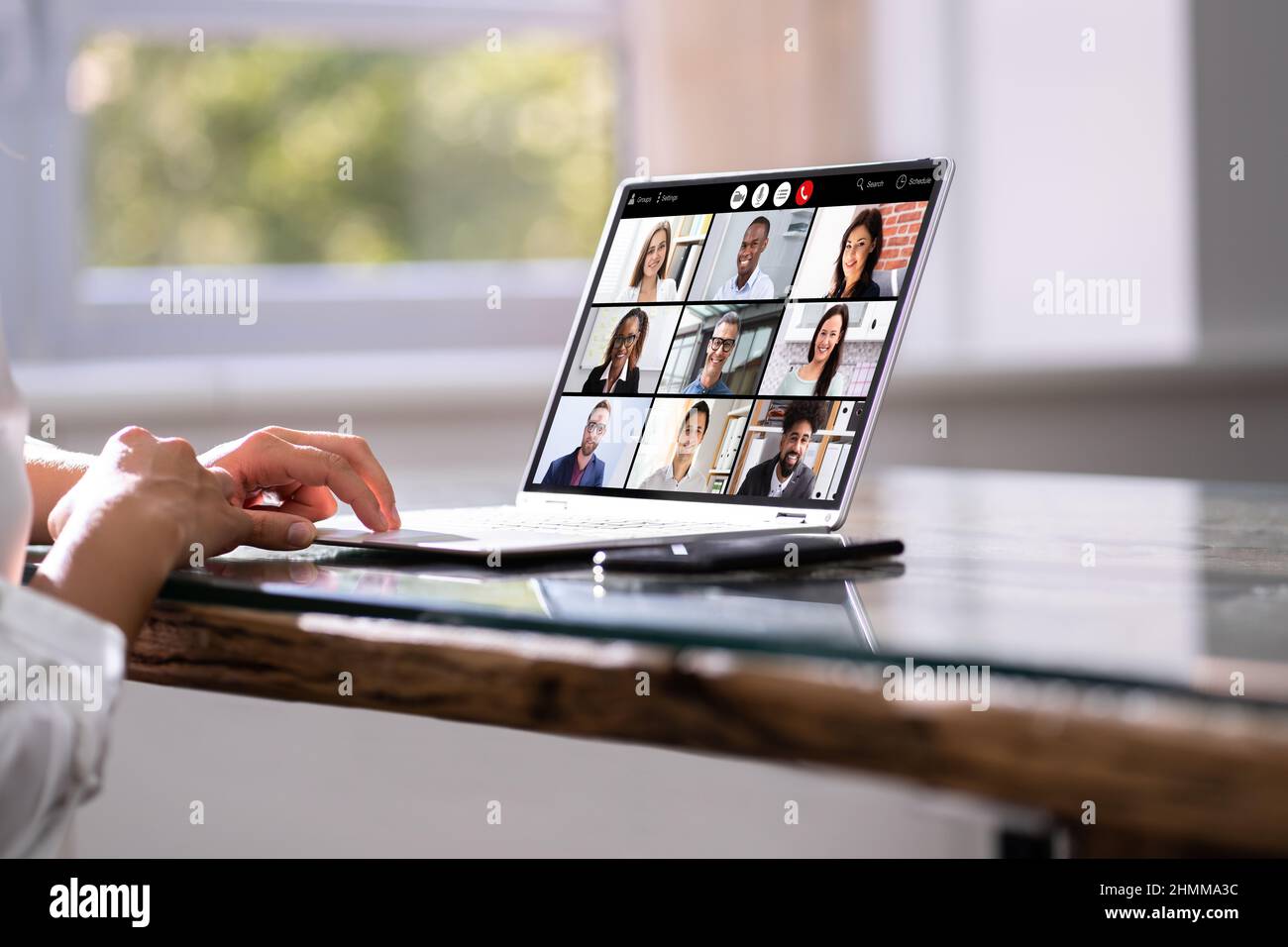Teacher Hosting Online Class Using Video Conference On Laptop Stock ...