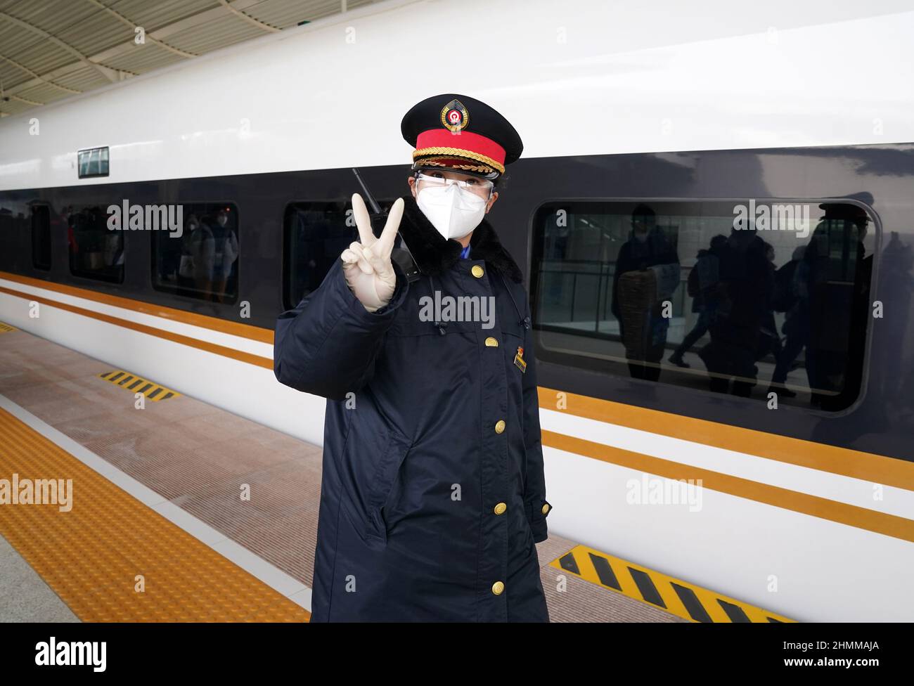 A train conductor at Taizicheng railway station during day seven of the ...