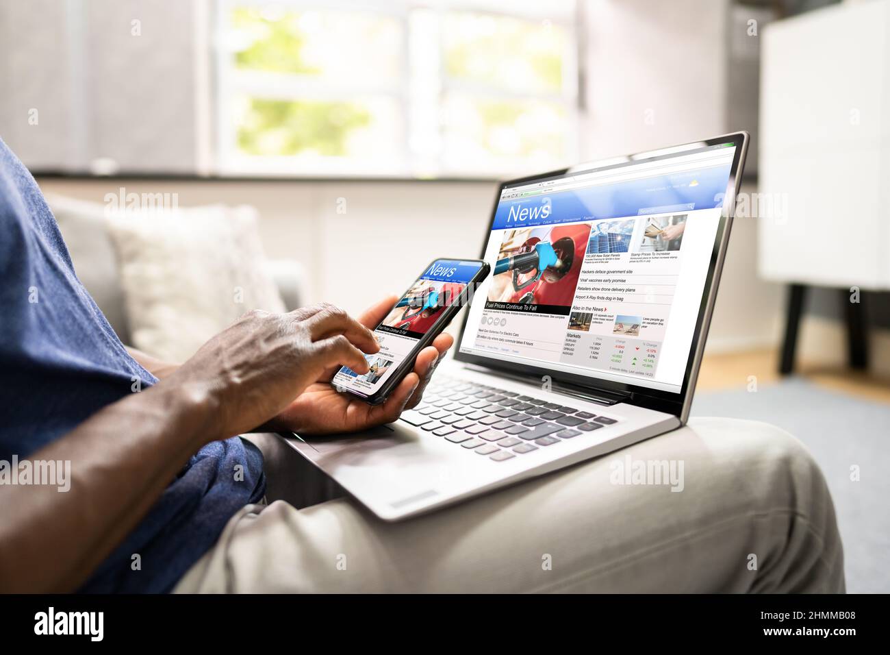 Watching news hi-res stock photography and images - Alamy