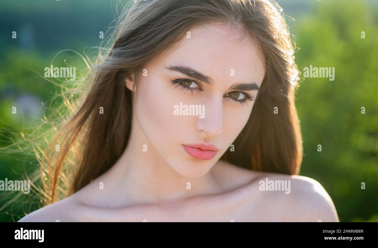 Portrait of beautiful young woman. Outdoor portrait of a cute girl ...