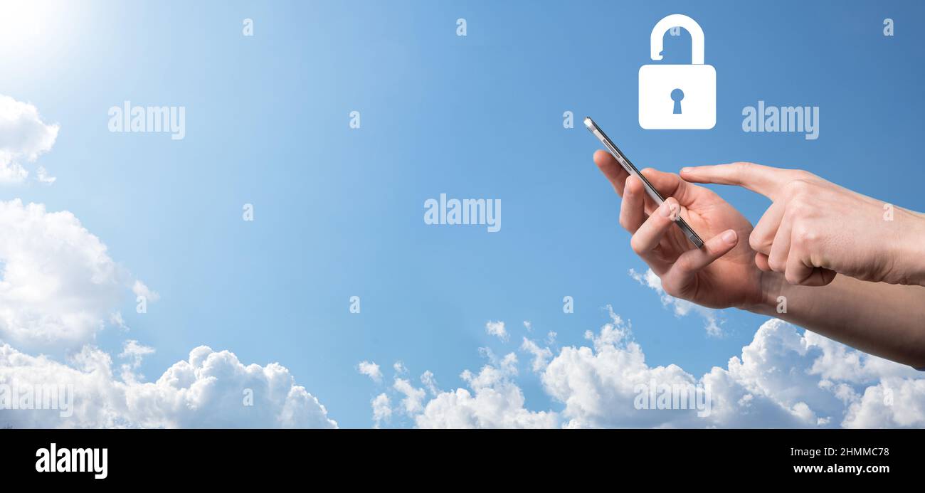 Male hand holding a lock padlock icon.Cyber security network. Internet ...
