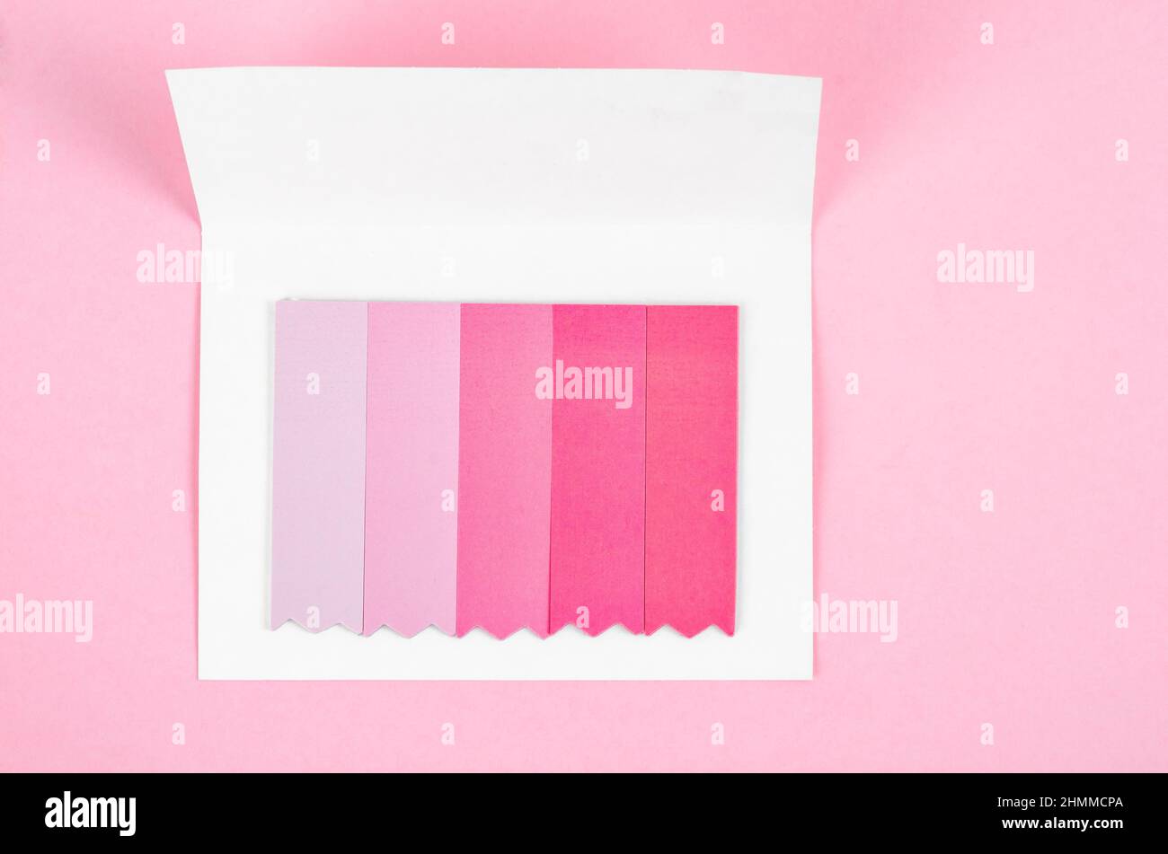 Set of multicolored sticker paper index on pink background Stock Photo ...